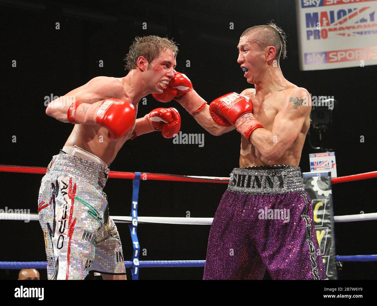 Shinny Bayaar (purple shorty) draws with Ashley Sexton in a Flyweight ...