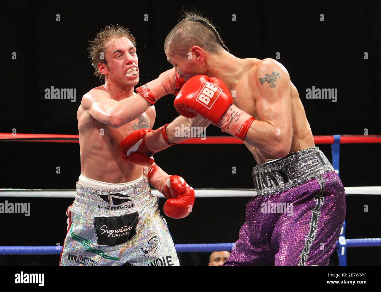 Shinny Bayaar (purple shorty) draws with Ashley Sexton in a Flyweight ...
