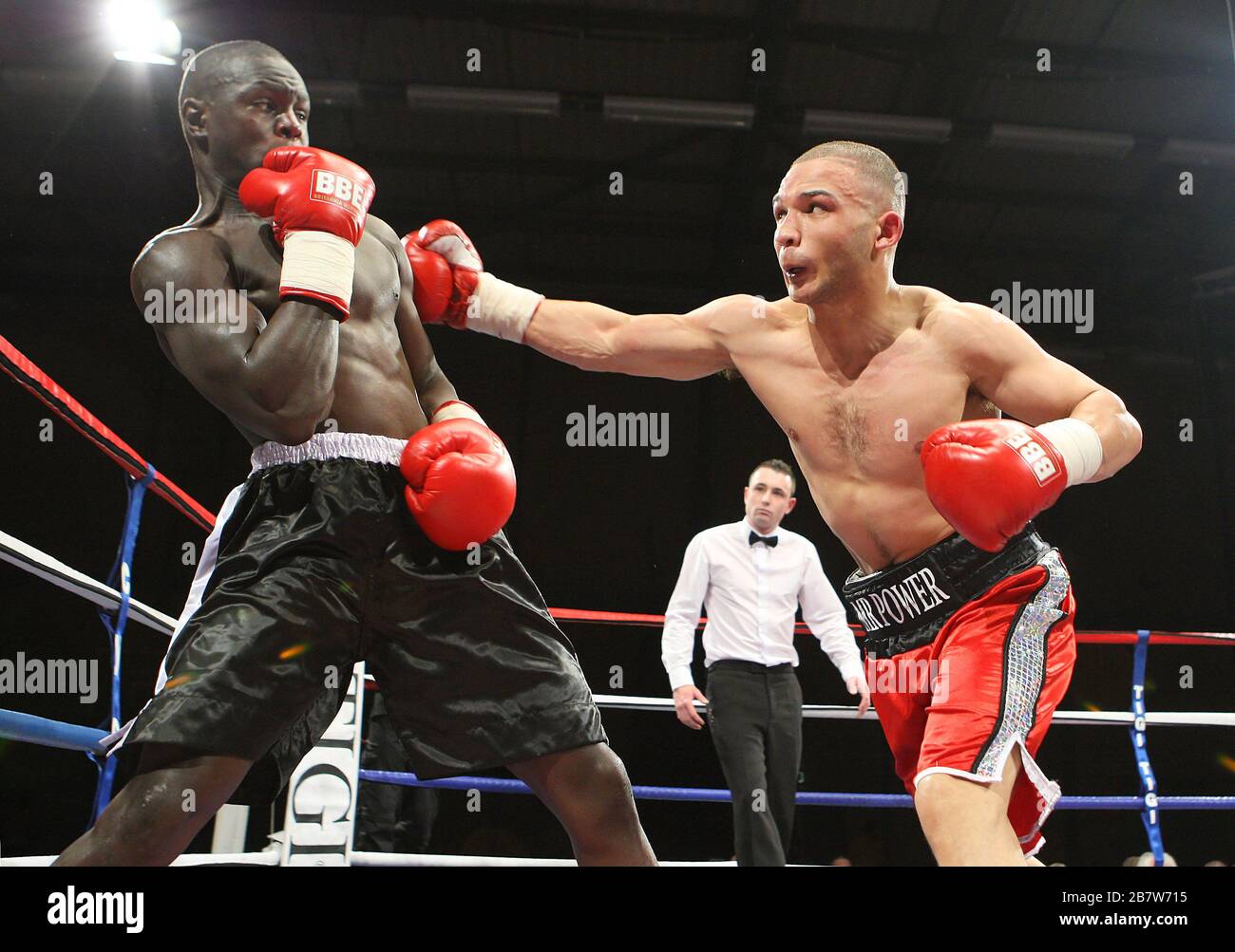 Erick Ochieng (black shorts) defeats Curtis Valentine in a Light ...