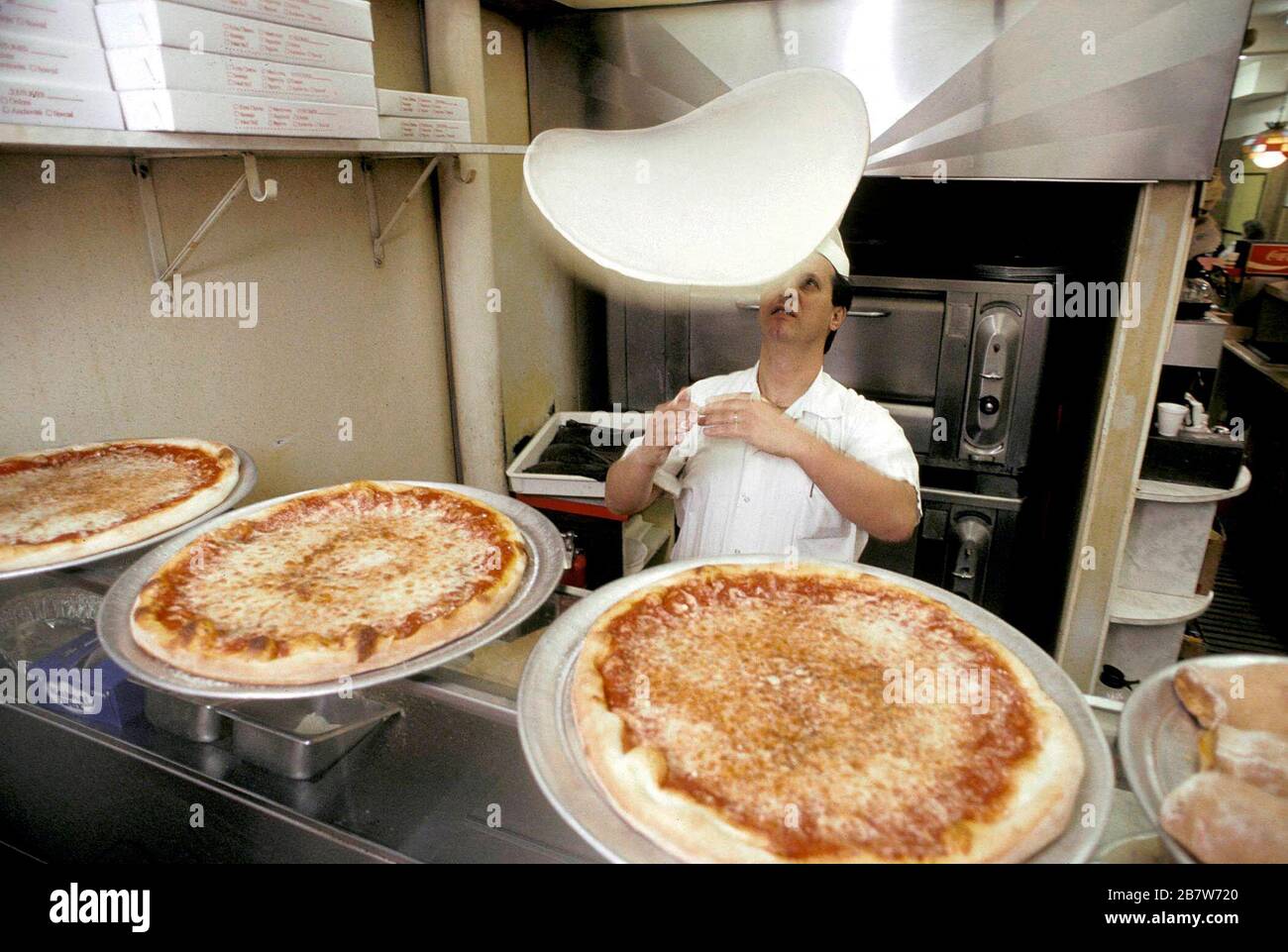 Hand tossed pizza hi-res stock photography and images - Alamy