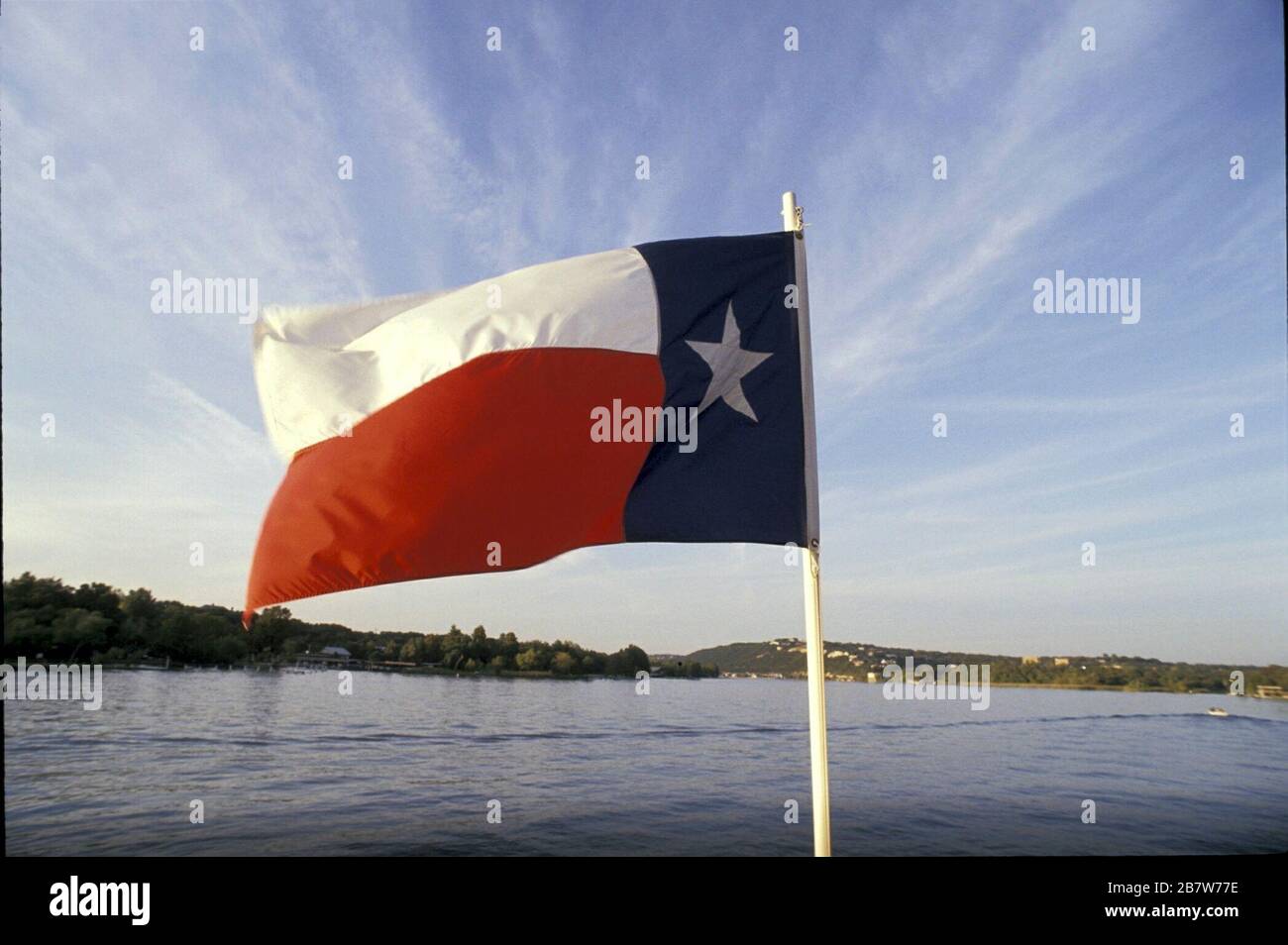 Austin, Texas USA: Texas flag flying over Lake Austin. ©Bob Daemmrich ...