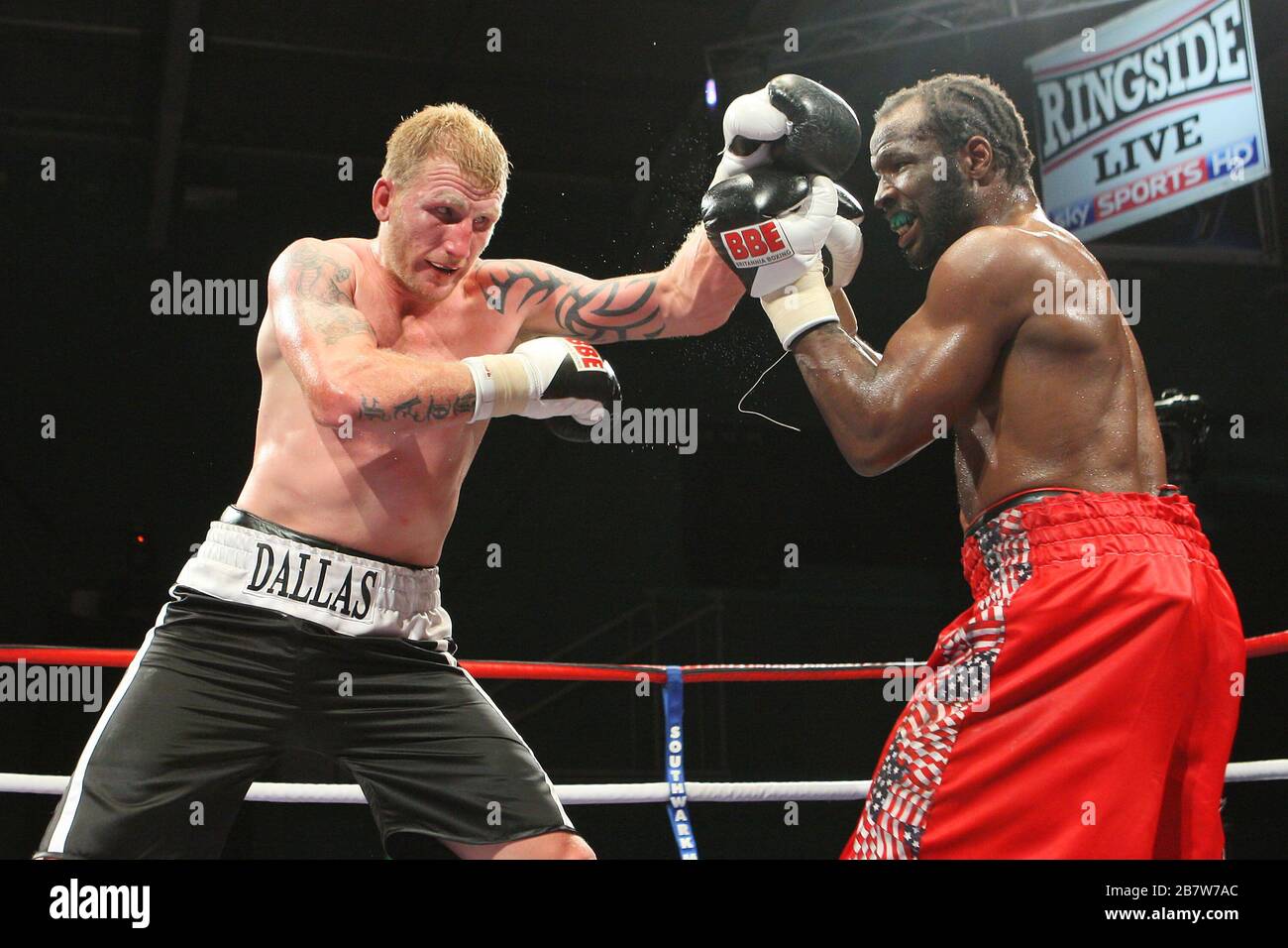 Tom Dallas (black shorts) defeats Zack Page (red shorts) in a ...