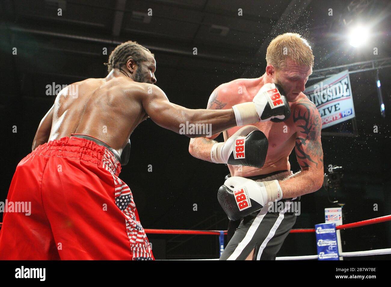 Tom Dallas (black shorts) defeats Zack Page (red shorts) in a ...