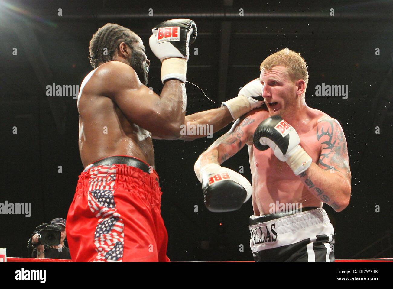 Tom Dallas (black shorts) defeats Zack Page (red shorts) in a ...