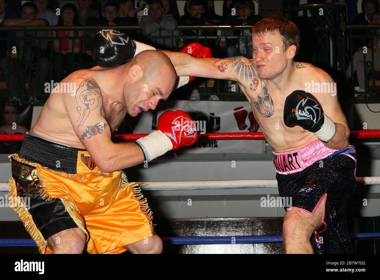 Scott Hartley (black/pink shorts) draws with Stuart Maddox in a Super ...