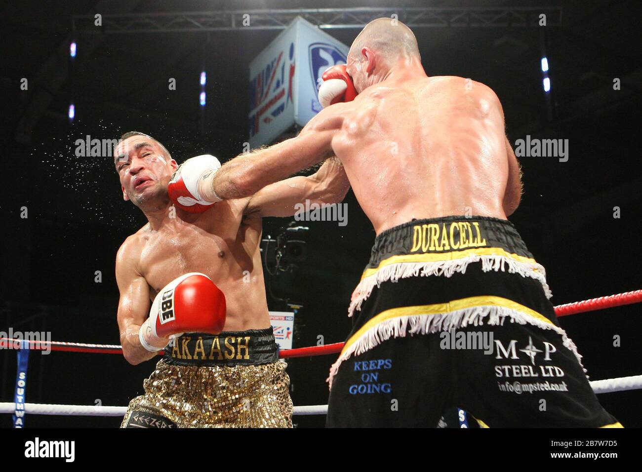 Ben Jones (black/yellow shorts) defeats Akaash Bhatia (gold shorts) in ...