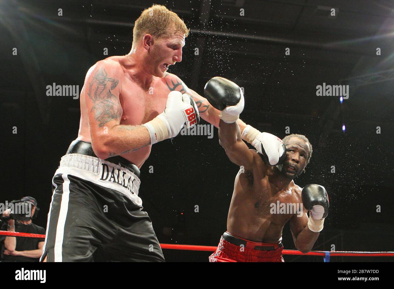 Tom Dallas (black shorts) defeats Zack Page (red shorts) in a ...