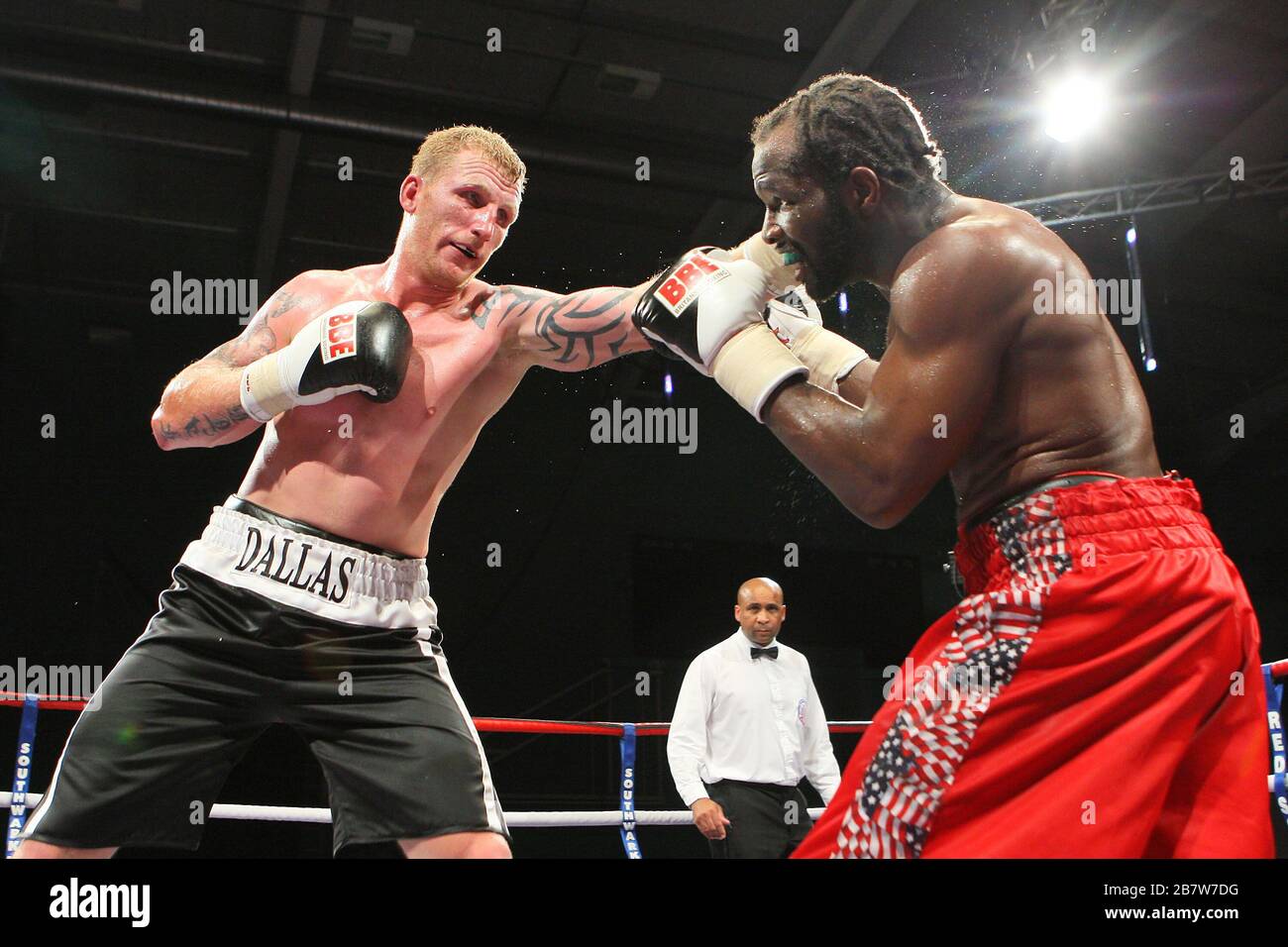 Tom Dallas (black shorts) defeats Zack Page (red shorts) in a ...