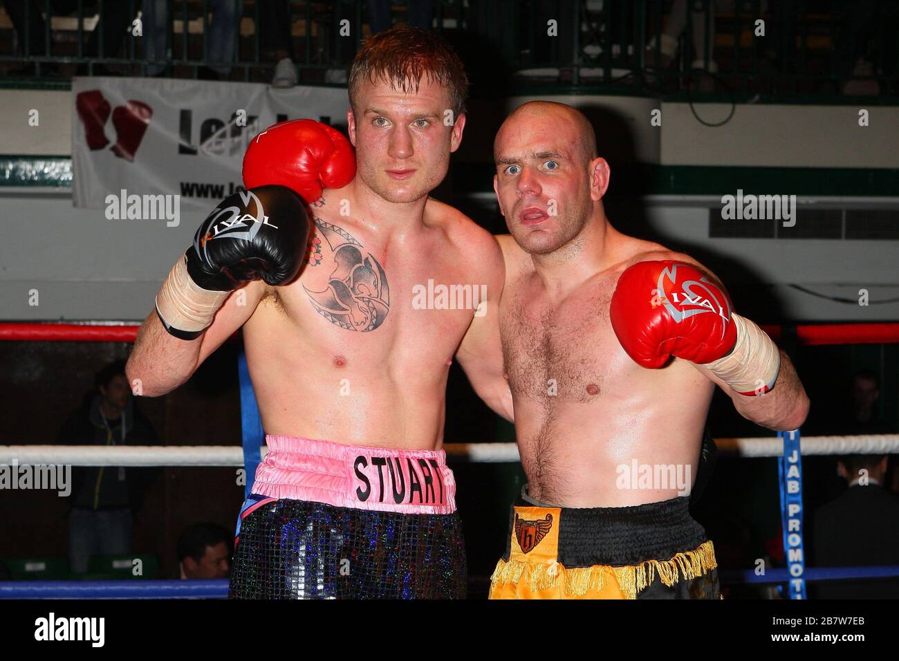 Scott Hartley (black/pink shorts) draws with Stuart Maddox in a Super ...