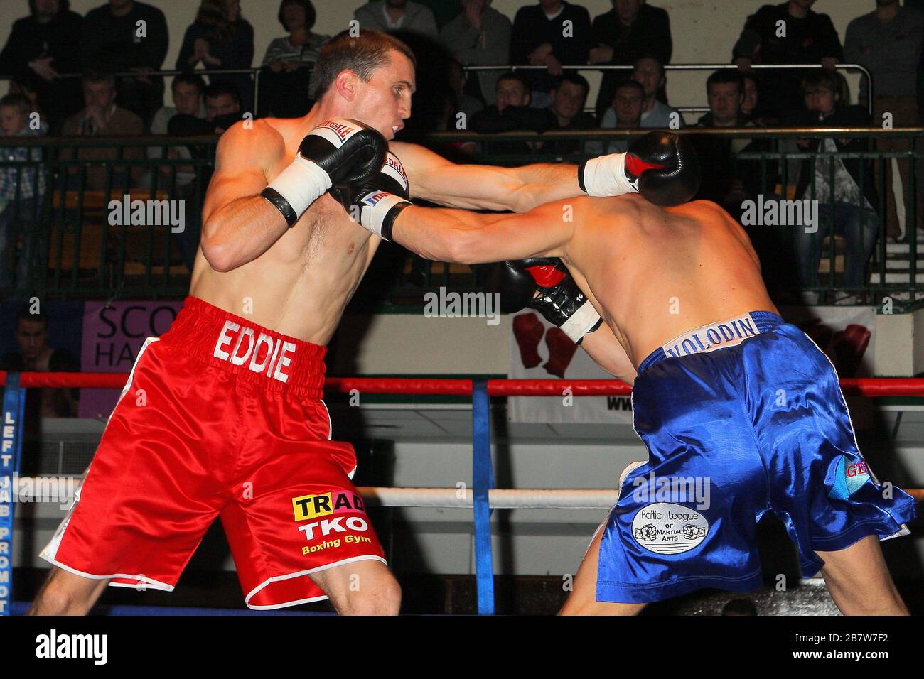 Eddie Corcoran (red shorts) defeats Sergejs Volodins in a Welterweight ...