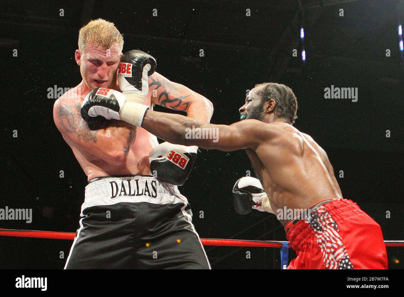 Tom Dallas (black shorts) defeats Zack Page (red shorts) in a ...