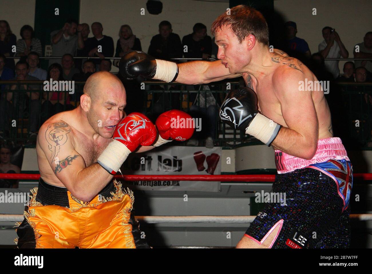 Scott Hartley (black/pink shorts) draws with Stuart Maddox in a Super-Middleweight boxing ...