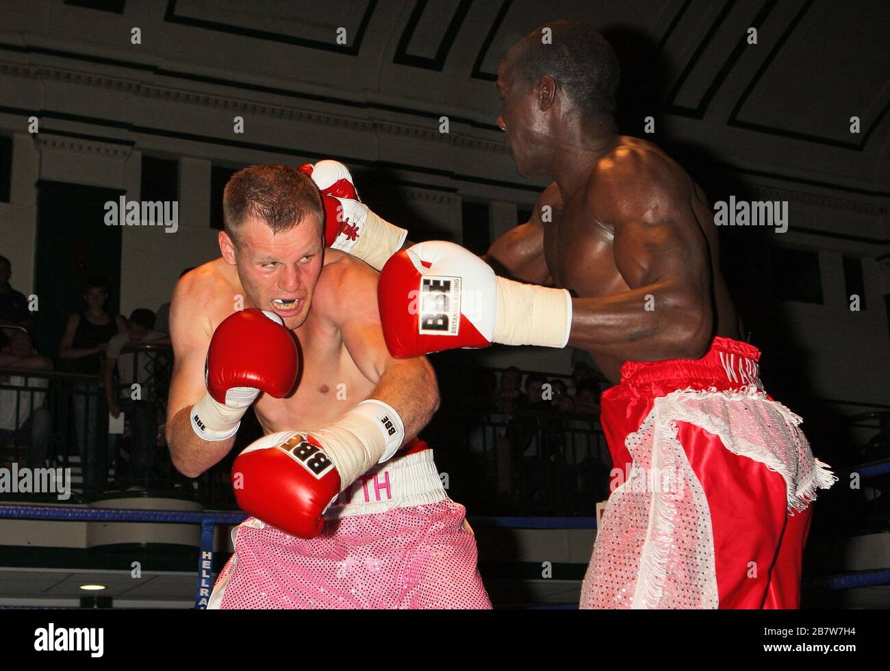 Joe Smyth (St Albans, pink shorts) defeats Hastings Rasani (Zimbabwe ...
