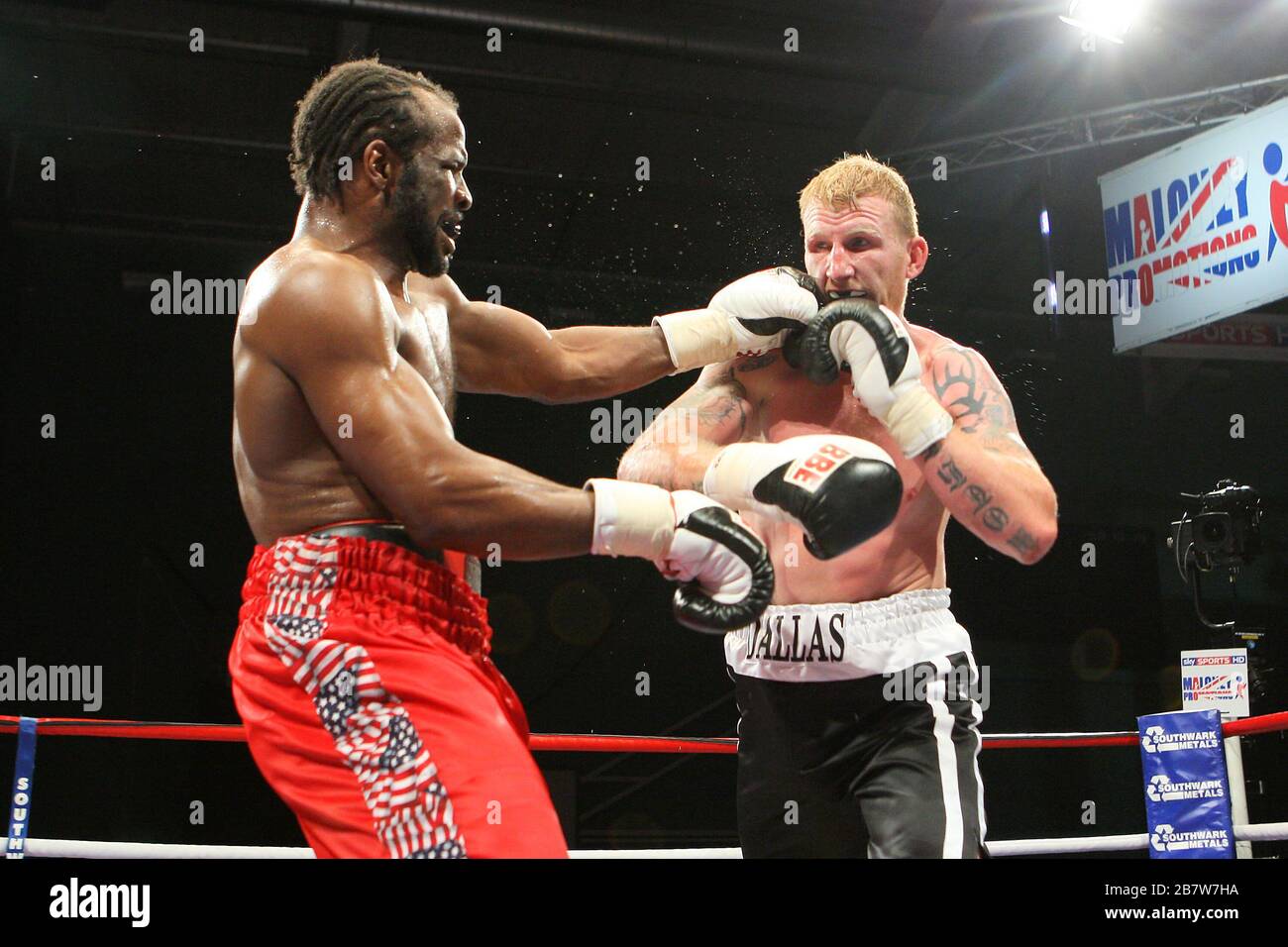 Tom Dallas (black shorts) defeats Zack Page (red shorts) in a ...