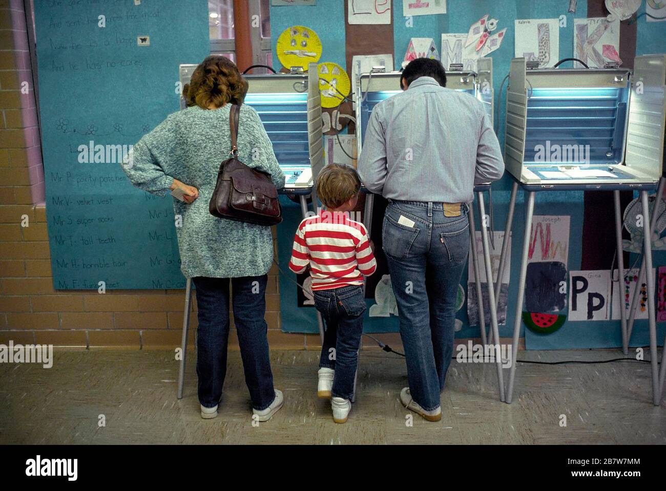 Austin Texas USA: Child, too young to vote, stands between his parents ...