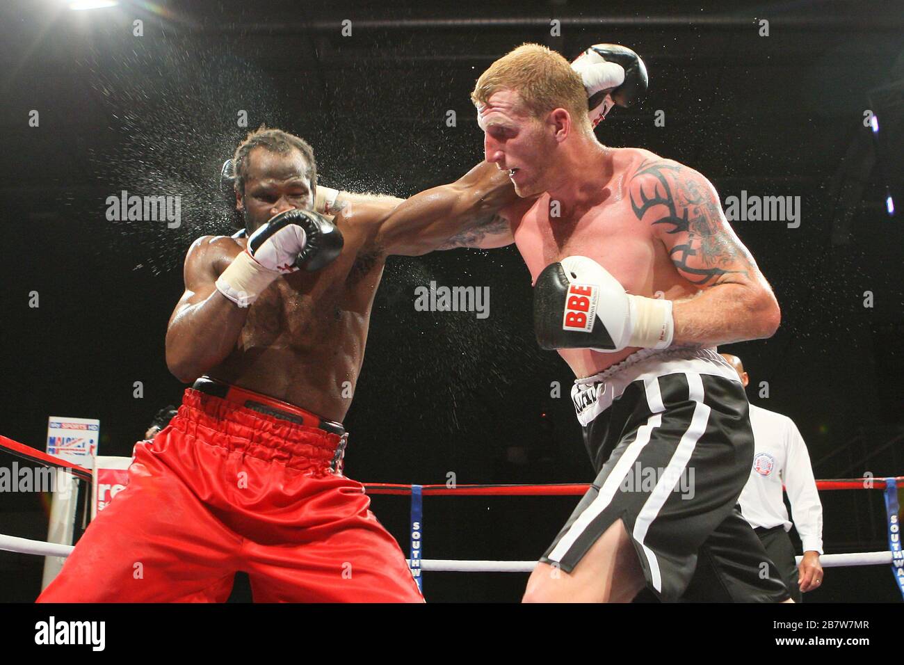 Tom Dallas (black shorts) defeats Zack Page (red shorts) in a ...