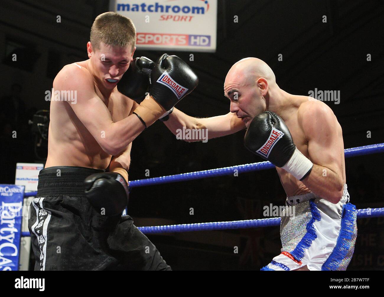 Stuart Hall (white/blue shorts) defeats Richard Szebeledi in a Super ...