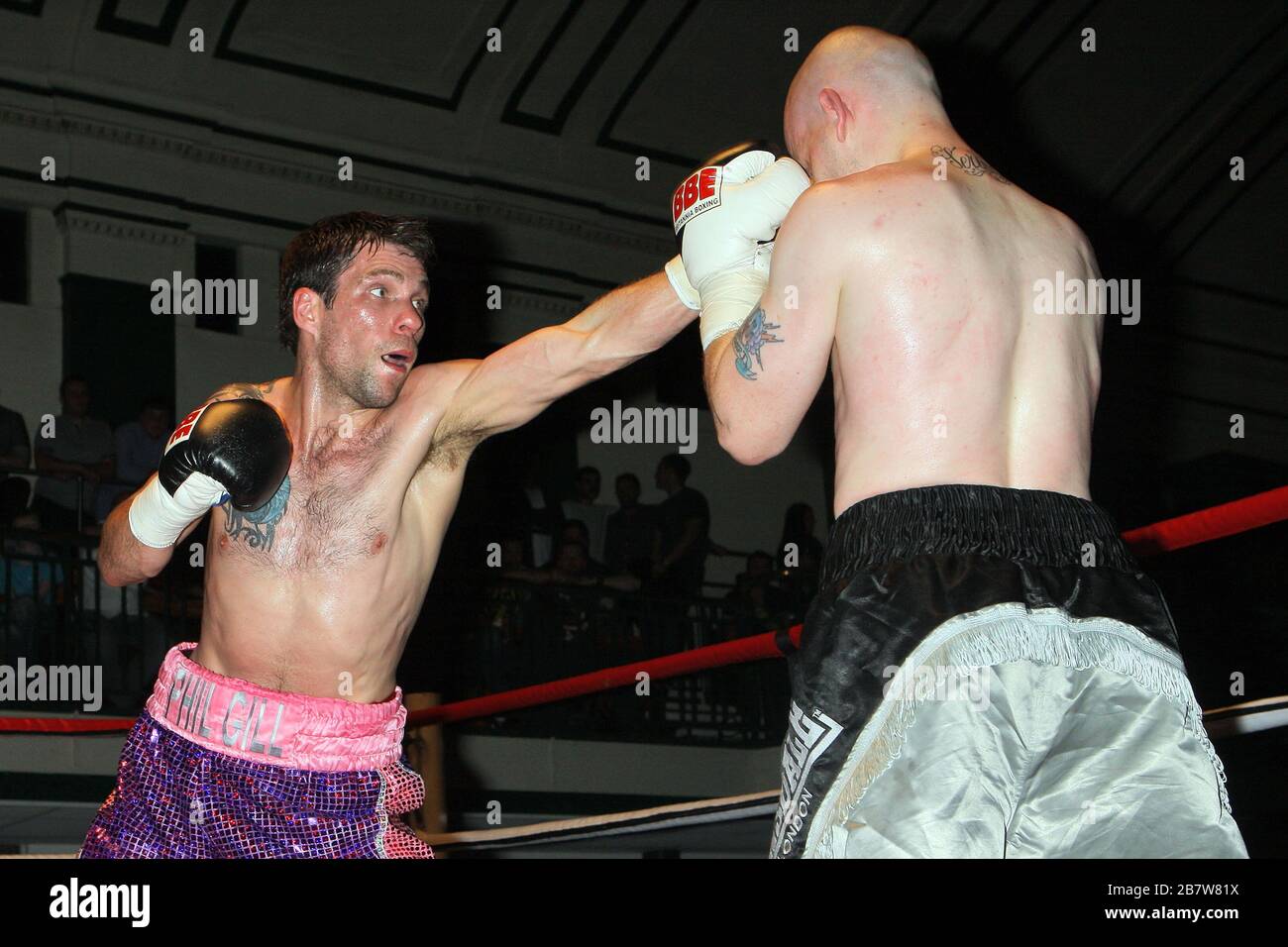 Phil Gill (purple shorts) defeats Damien Turner in a Light-Welterweight ...