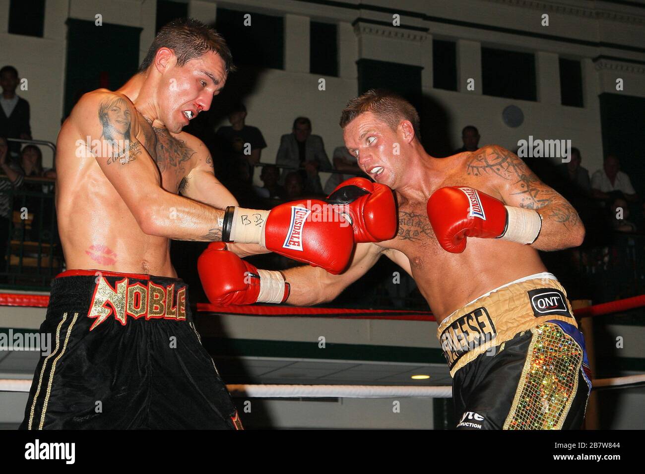 Lee Noble (black shorts) defeats Pat McAleese in a Light-Middleweight ...