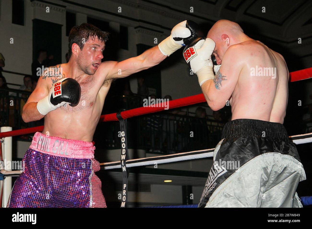 Phil Gill (purple shorts) defeats Damien Turner in a Light-Welterweight ...