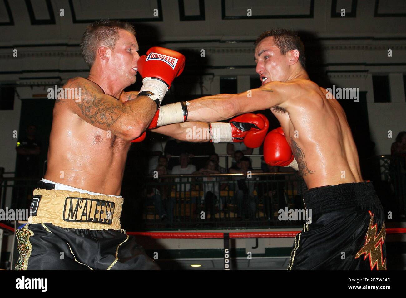 Lee Noble (black shorts) defeats Pat McAleese in a Light-Middleweight ...