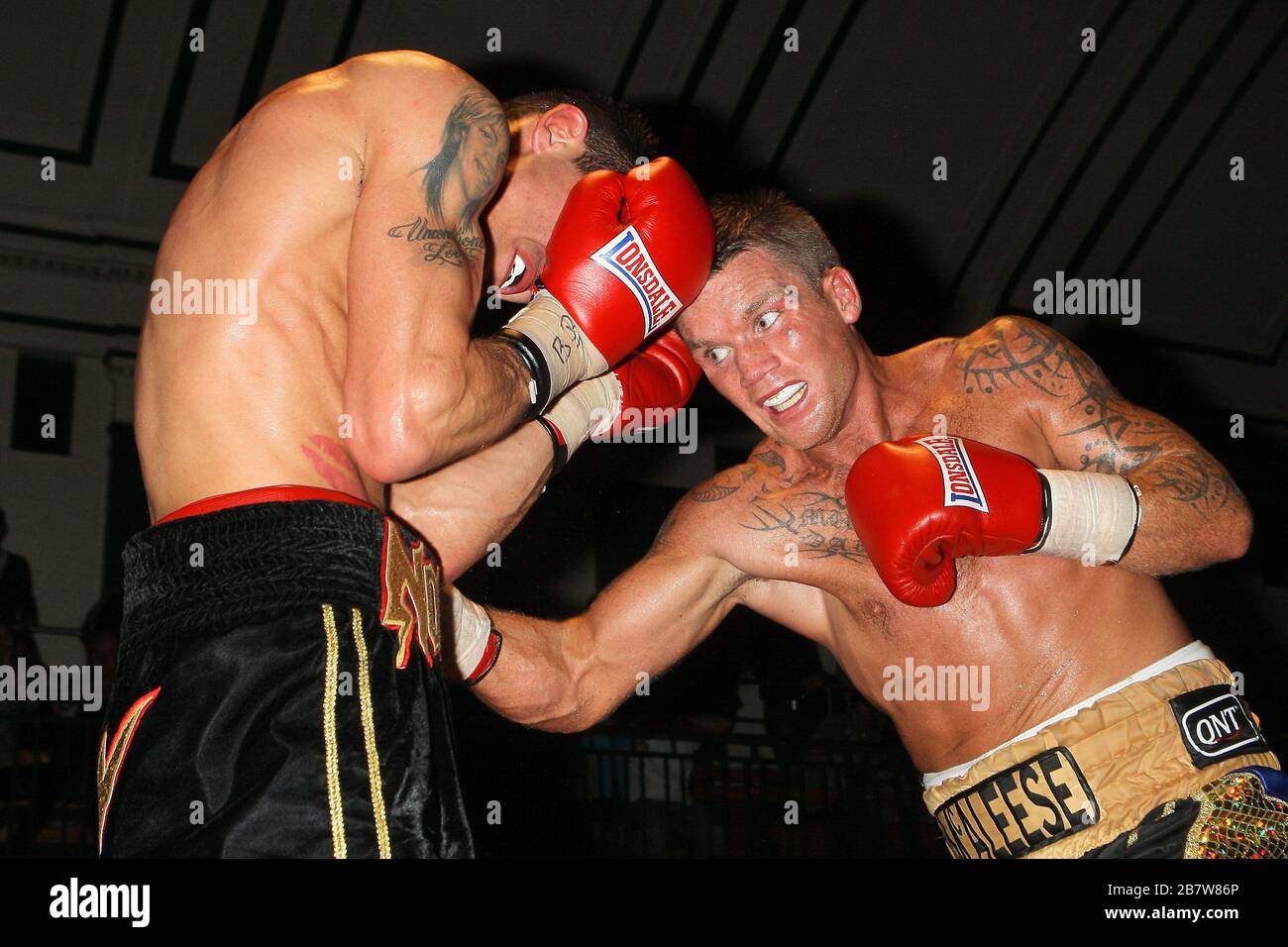 Lee Noble (black shorts) defeats Pat McAleese in a Light-Middleweight ...