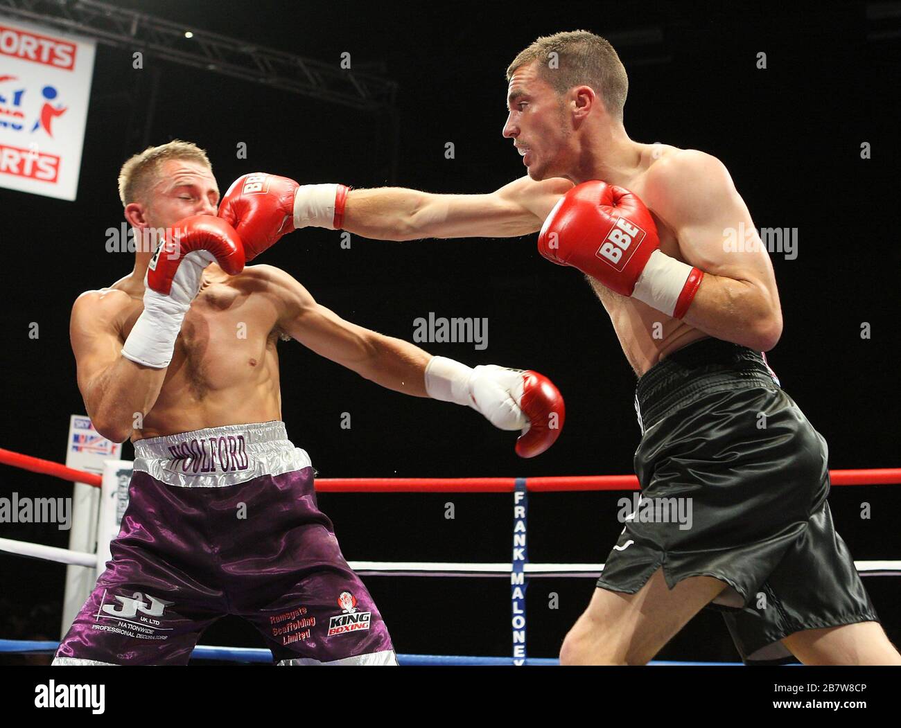 Martin Welsh (black shorts) defeats Vinny Woolford in a Welterweight ...
