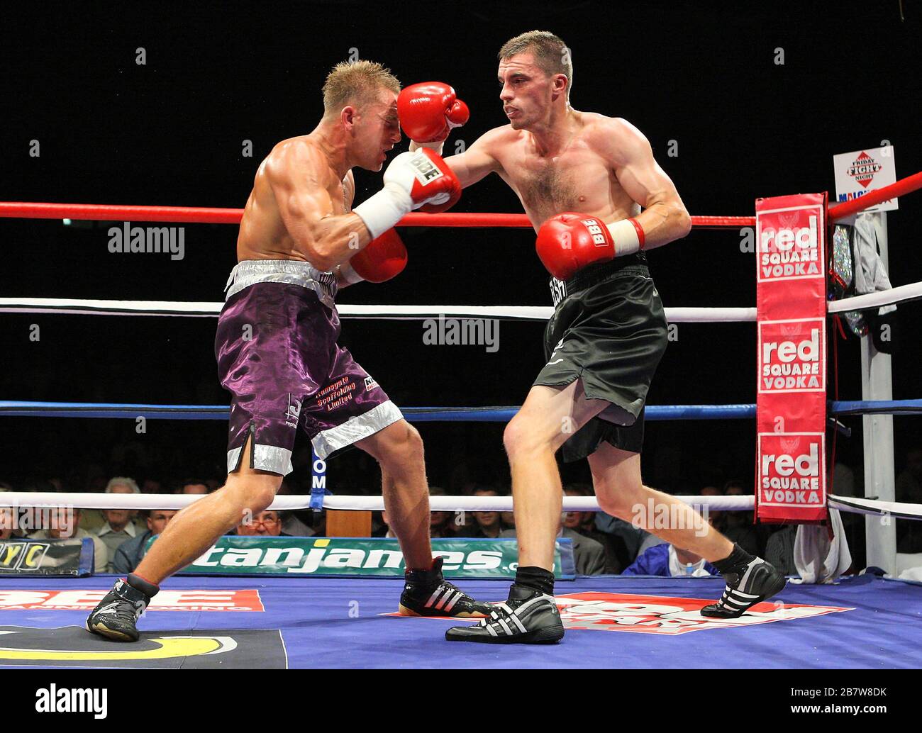 Martin Welsh (black shorts) defeats Vinny Woolford in a Welterweight ...