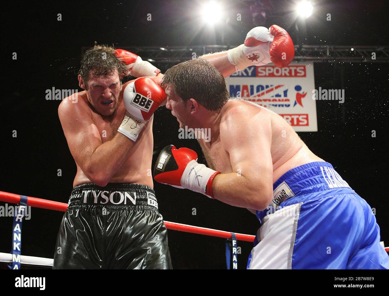 Tyson Fury (black shorts) defeats John McDermott in a Heavyweight ...