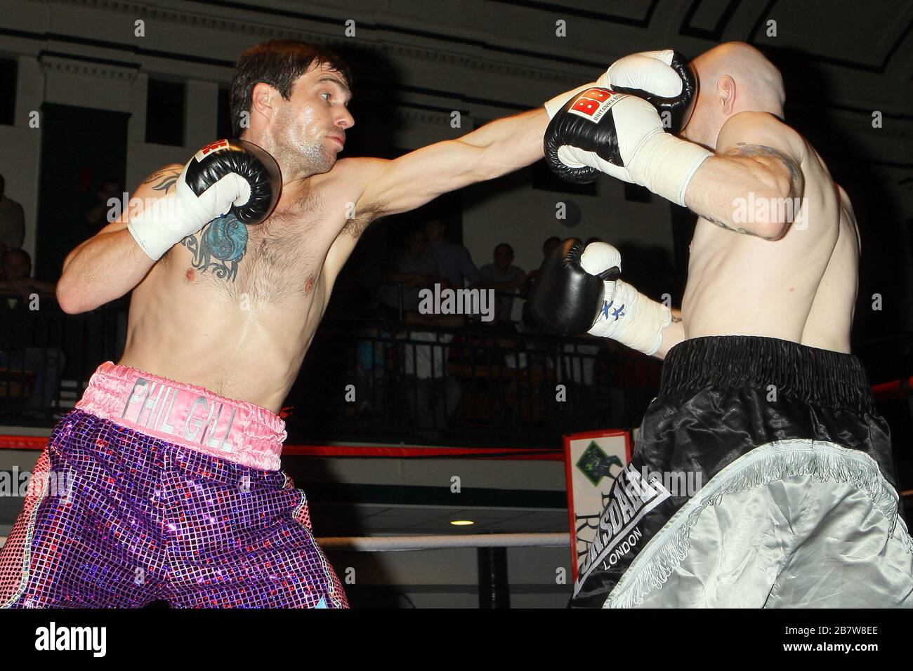 Phil Gill (purple shorts) defeats Damien Turner in a Light-Welterweight ...
