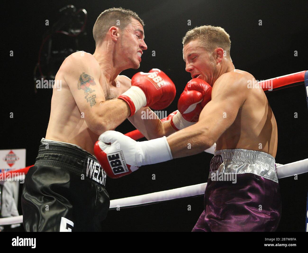 Martin Welsh (black shorts) defeats Vinny Woolford in a Welterweight ...