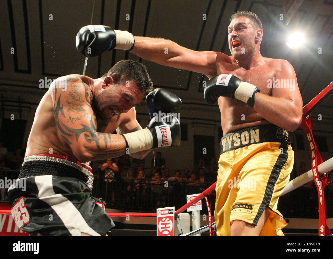 Tyson Fury (gold shorts) defeats Rich Power in a Heavyweight boxing ...