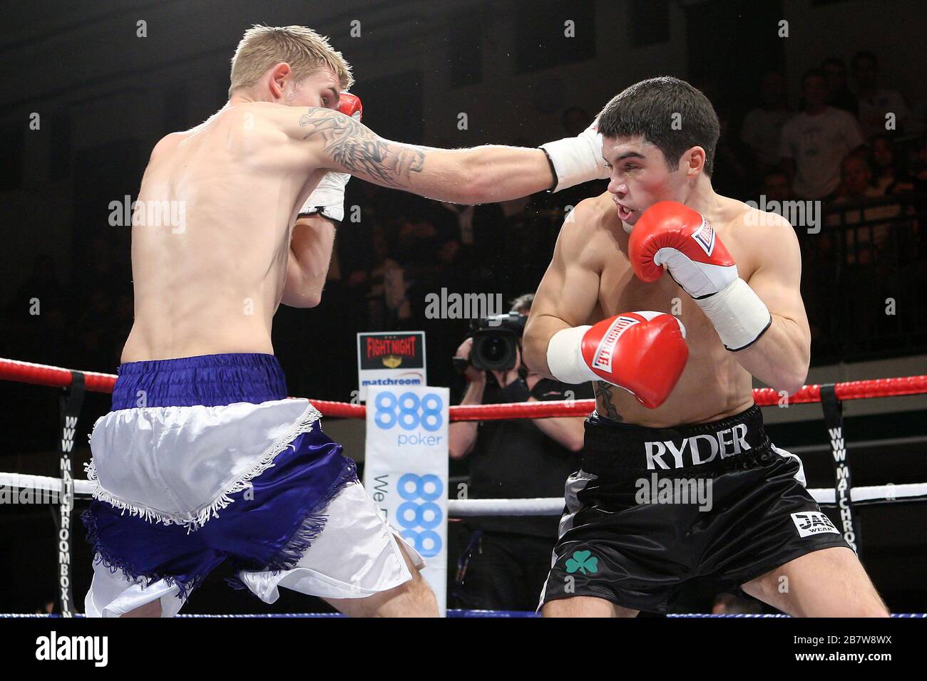 John Ryder (black shorts) defeats Luke Osman in a Middleweight boxing ...