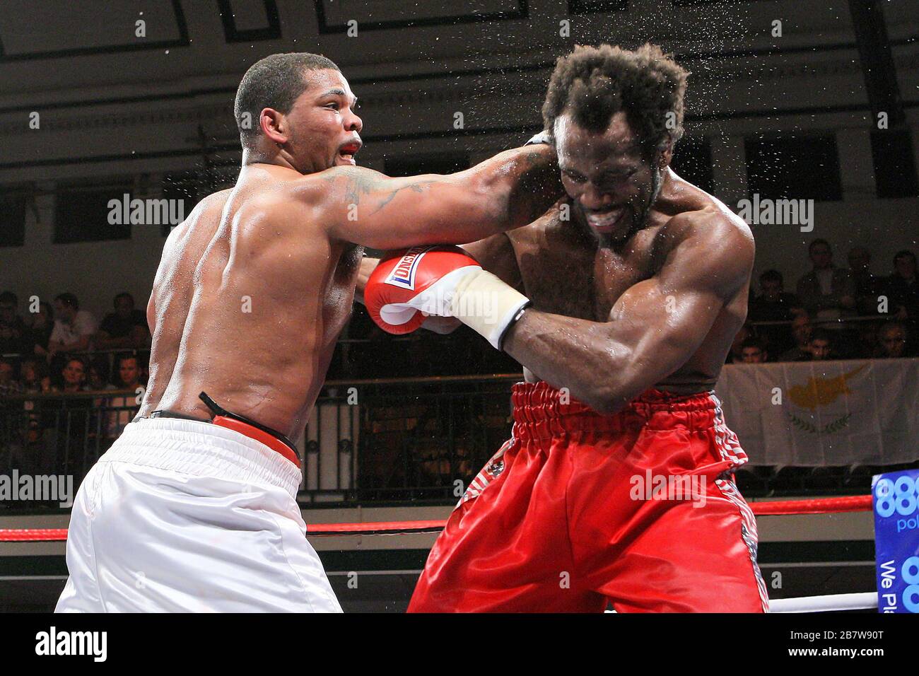 Mike Perez (white shorts) defeats Zack Page in a Heavyweight boxing ...