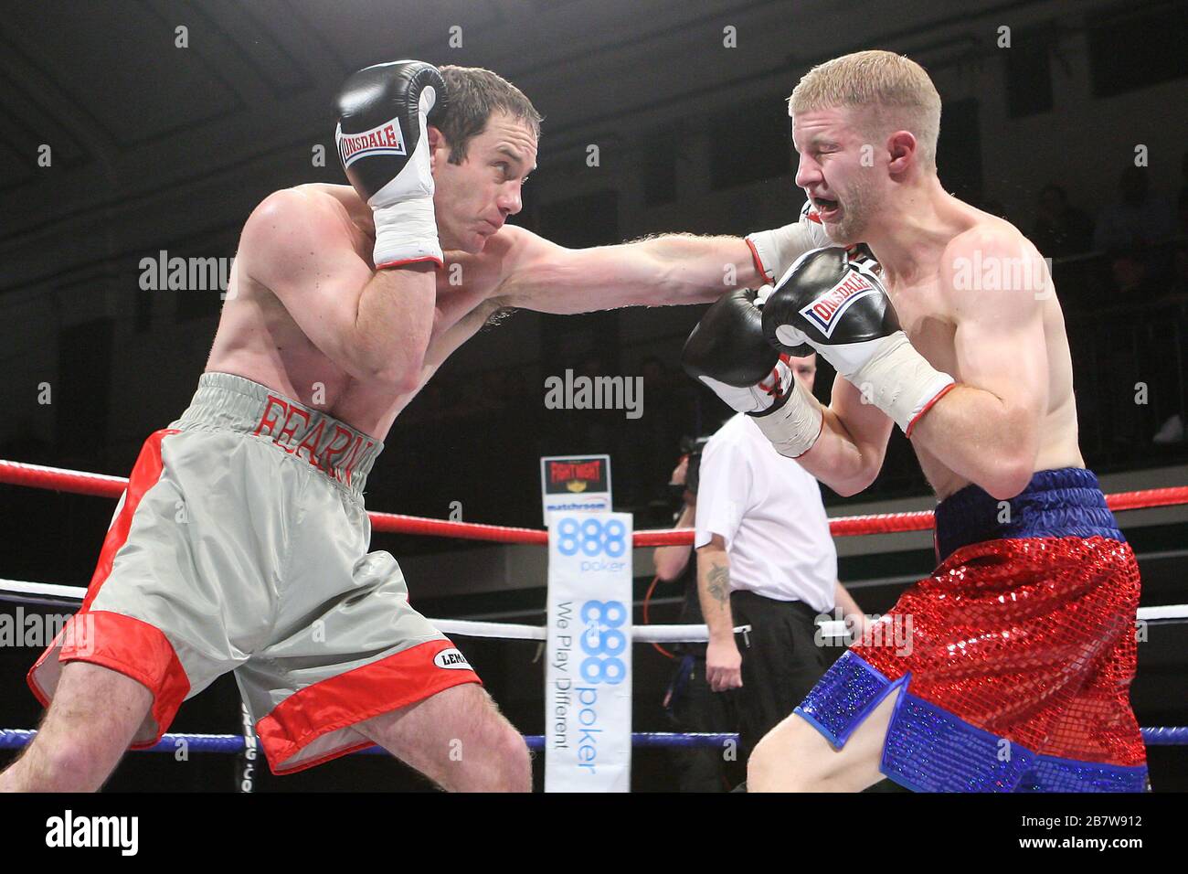 Ryan Taylor (red/blue shorts) defeats Graham Fearn in a Lightweight ...