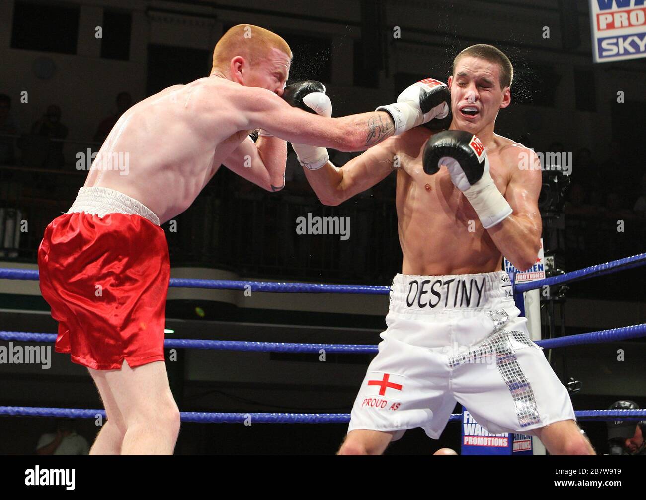 Liam Walsh (white shorts) defeats Jon Baguley in a Lightweight boxing ...