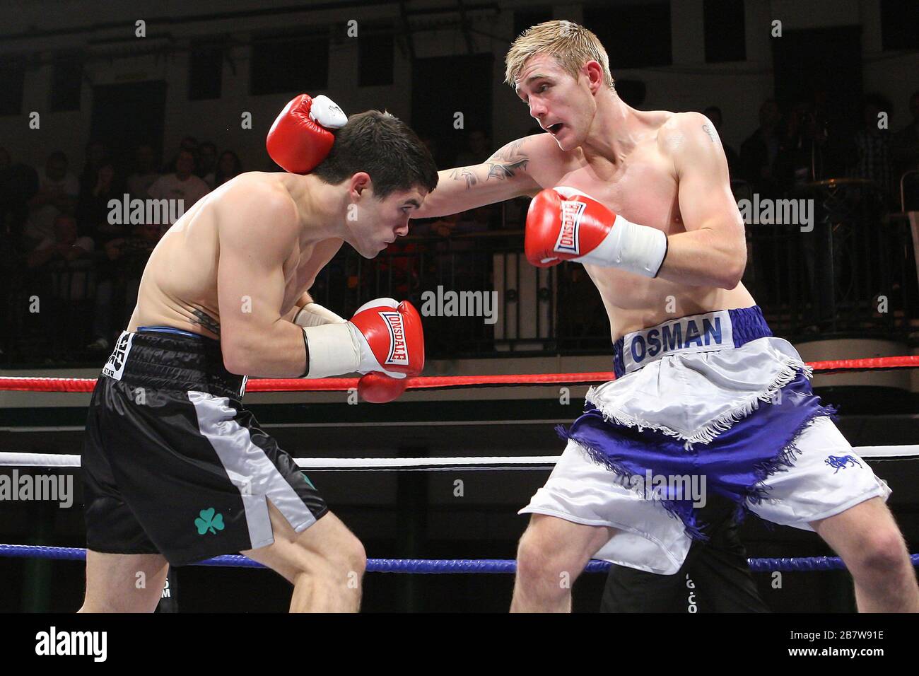 John Ryder (black shorts) defeats Luke Osman in a Middleweight boxing ...