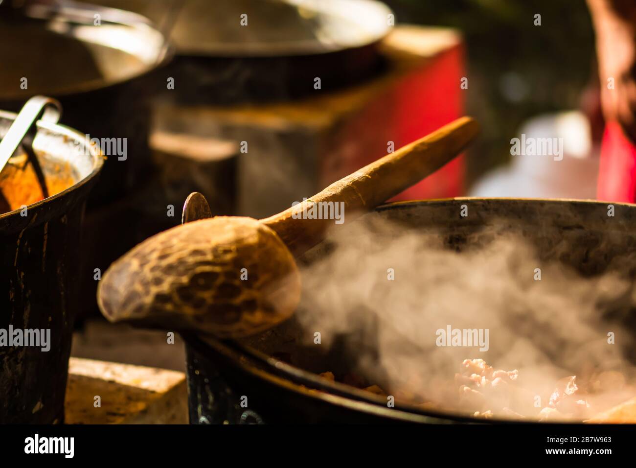 Wooden spoon over cauldron hi-res stock photography and images - Alamy