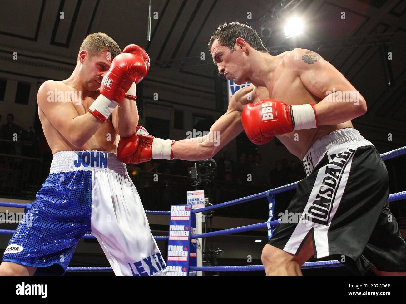 John Wayne Hibbert (blue.white shorts) defeats Kevin McCauley in a ...