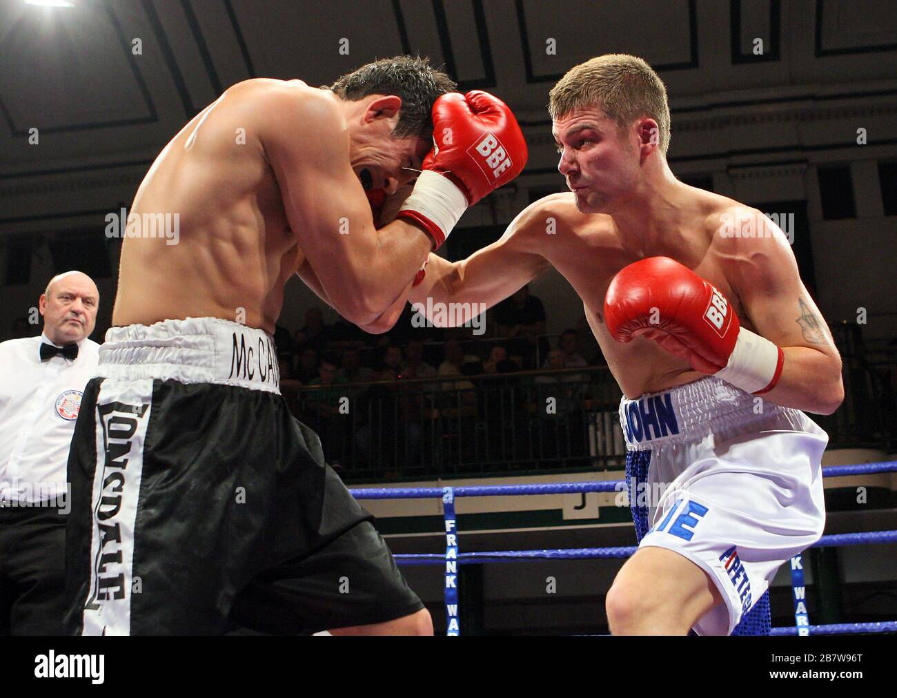 John Wayne Hibbert (blue.white shorts) defeats Kevin McCauley in a ...