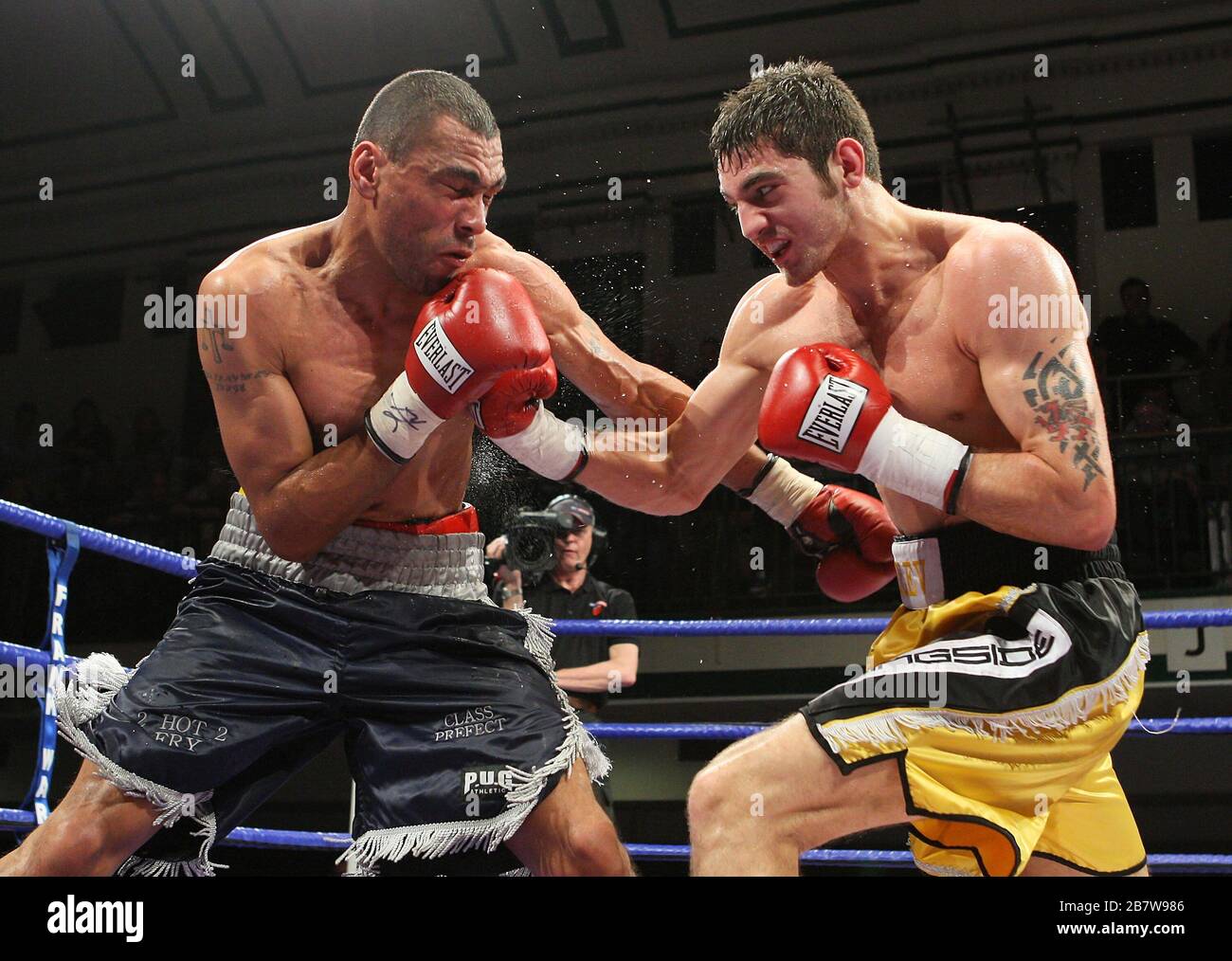 Nathan Cleverly (yellow/black shorts) defeats Courtney Fry in a Light ...