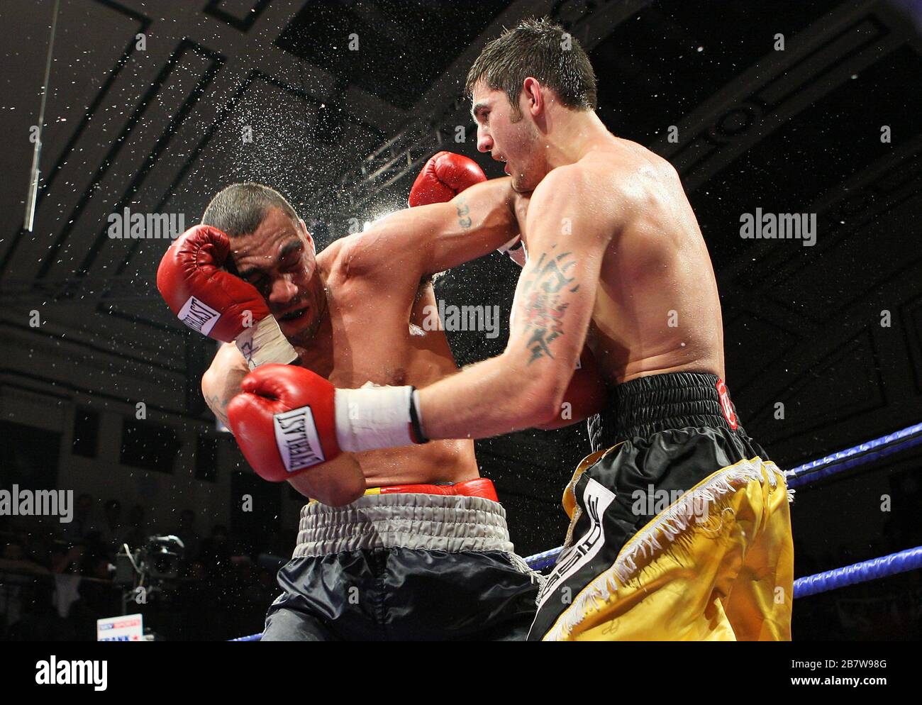 Nathan Cleverly (yellow/black shorts) defeats Courtney Fry in a Light ...