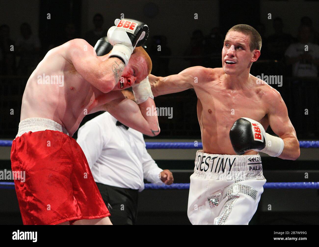 Liam Walsh (white shorts) defeats Jon Baguley in a Lightweight boxing ...