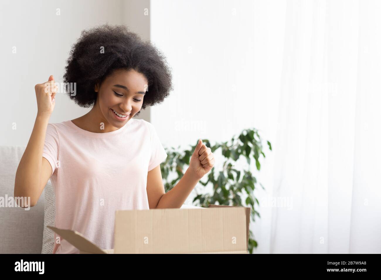 Customer is happy concept. Woman smiling receiving delivery Stock Photo ...