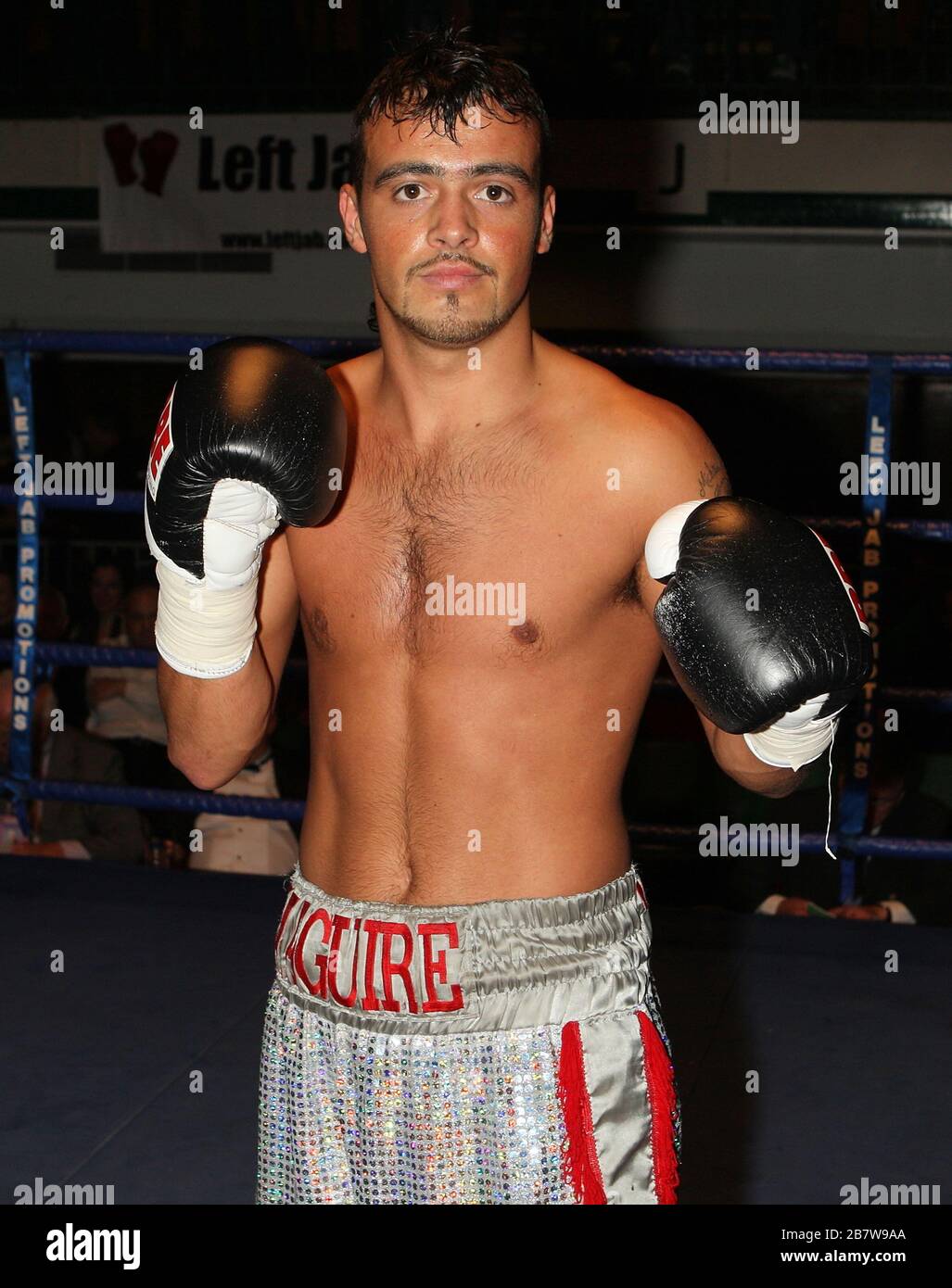 Michael Maguire (silver shorts) defeats Sergey Rozhakmens in a Super ...