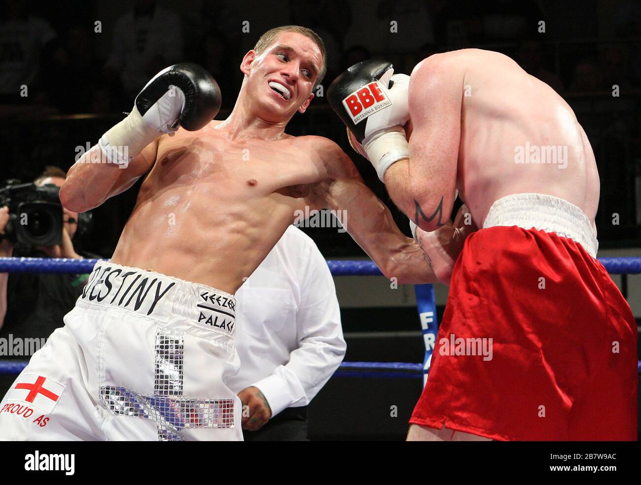Liam Walsh (white shorts) defeats Jon Baguley in a Lightweight boxing ...