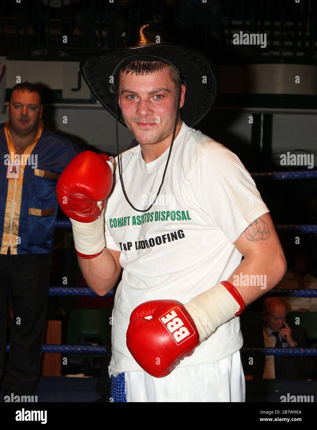 John Wayne Hibbert (white/blue shorts) defeats Bheki Moyo in a boxing ...