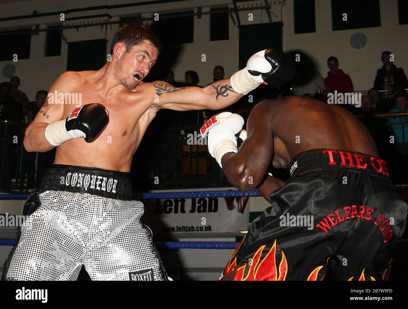 Tony Conquest (silver shorts) defeats Nick Okoth in a Cruiserweight ...