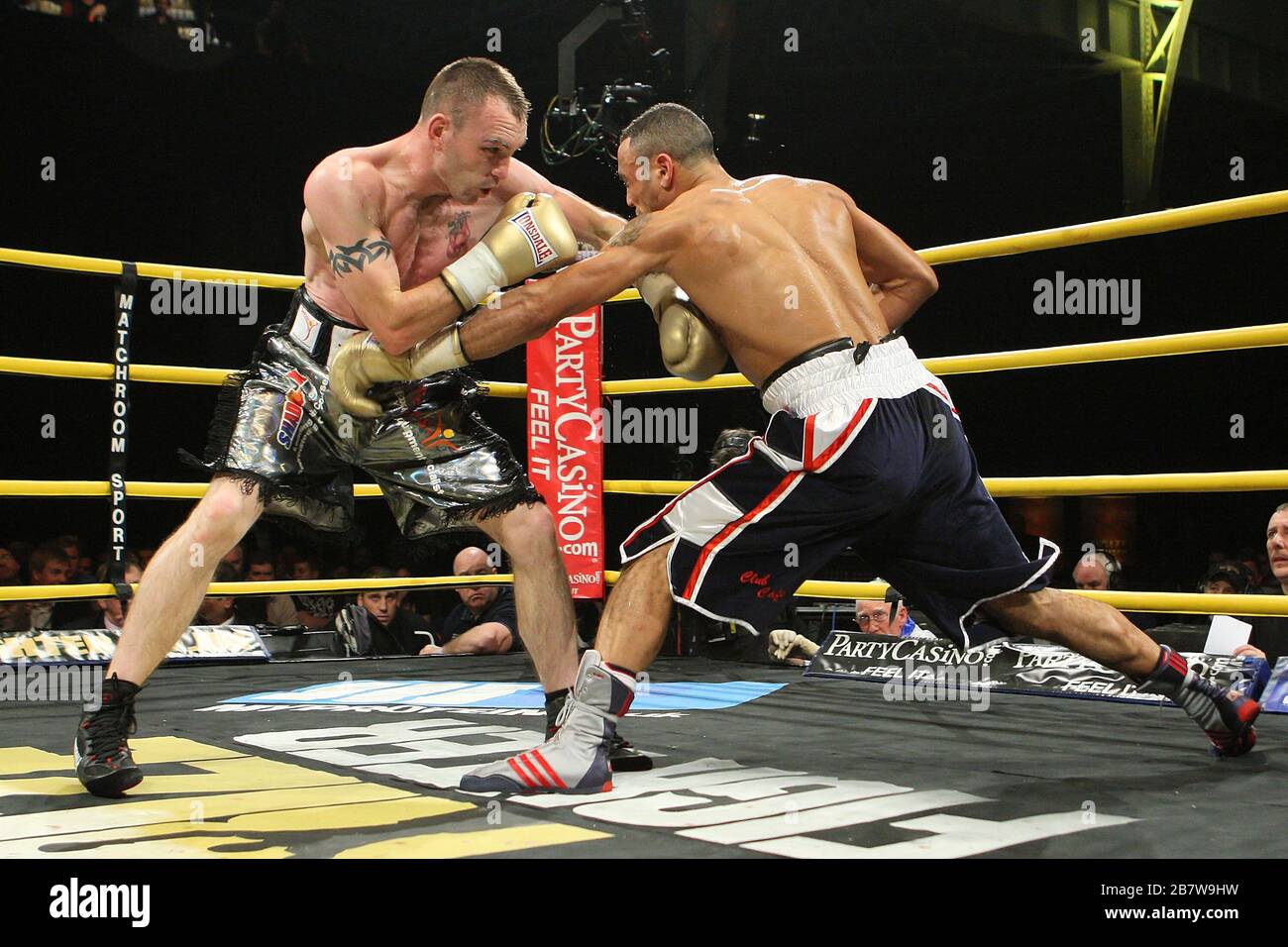 Colin Lynes (silver shorts) defeats Young Mutley in the Semi-Final of ...