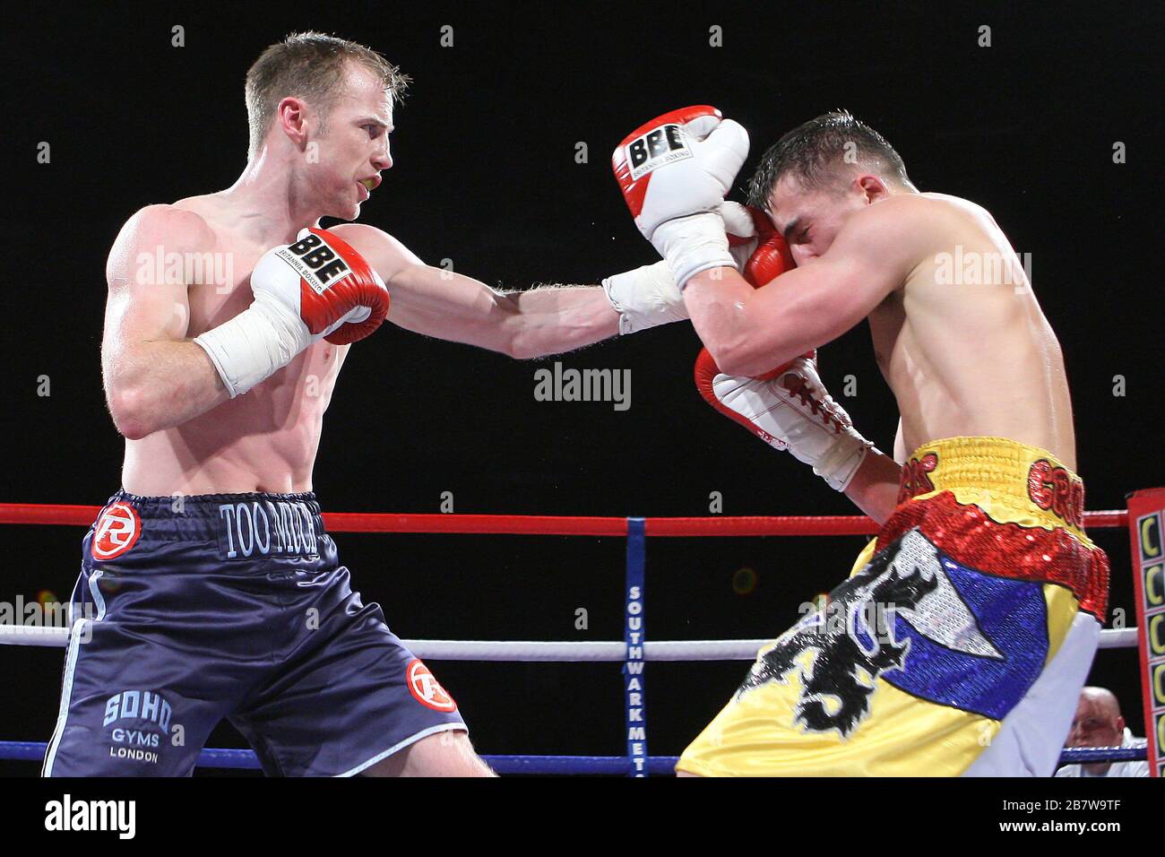 Martin Power (blue shorts) defeats Francis Croes in a Super-Flyweight ...